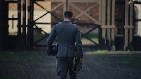 Back view of a soldier walking straight ... | Stock Video | Pond5
