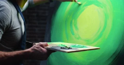 Back View of Talented Artist is drawing ... | Stock Video | Pond5