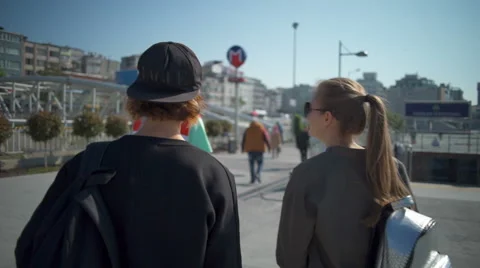 back view three young people walking in... | Stock Video | Pond5