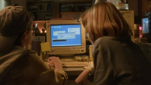 Back View of Two Boys using Computer in ... | Stock Video | Pond5