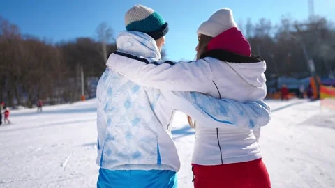 Back view two hugging female friends sta... | Stock Video | Pond5