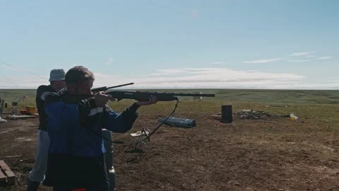 Back view of unrecognizable shooter shoo... | Stock Video | Pond5