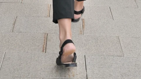 Back View of Walking Female Feet | Stock Video | Pond5