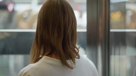 Back View of Woman in Moving Elevator wi... | Stock Video | Pond5