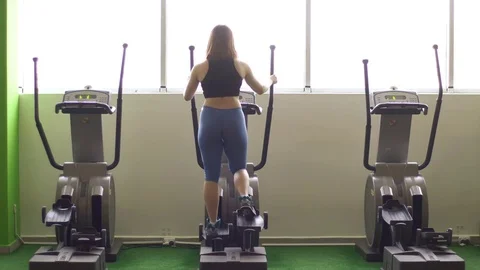 The back view of the woman working out o... | Stock Video | Pond5
