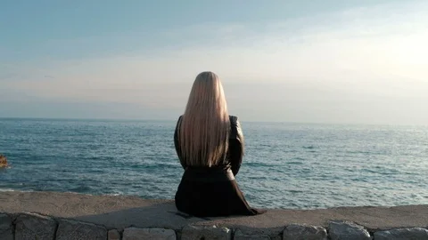 Back view of Young pretty woman with lon... | Stock Video | Pond5