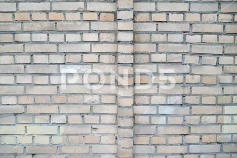 Photograph: Background of bricks with one abnormal row, brick wall ...