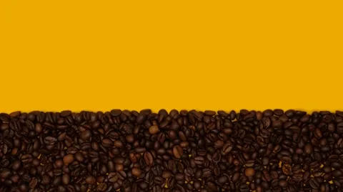 Background with moving coffee beans on y... | Stock Video | Pond5