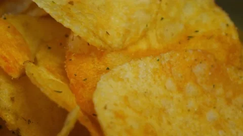 Background of Potato chips rotating clos... | Stock Video | Pond5
