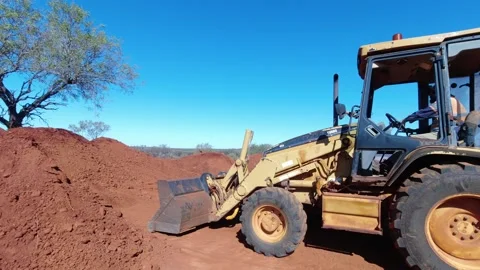 Backhoe Loader Tractor pushing Dirt, Hea... | Stock Video | Pond5
