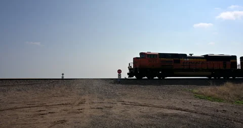BACKLIT VIEW OF FREIGHT TRAIN ENTERING A... | Stock Video | Pond5
