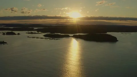 Backwards, pan right to left of sunset a... | Stock Video | Pond5