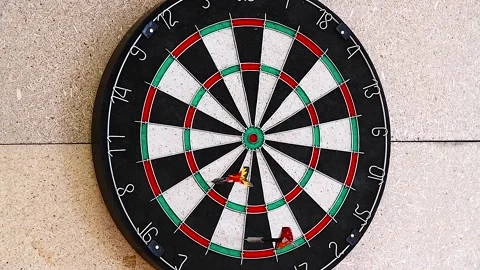 Bad shots on target of a dart board | Stock Video | Pond5