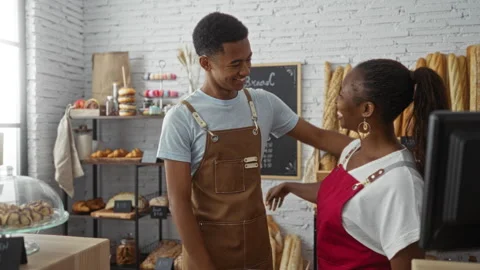 Bakers smiling and interacting together ... | Stock Video | Pond5