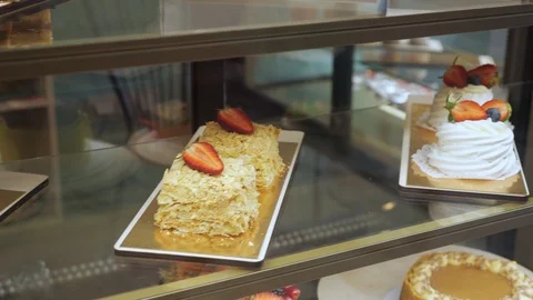 Bakery vitrine with cakes and pastries o... | Stock Video | Pond5