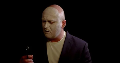 bald actor with mask plays angry charact... | Stock Video | Pond5