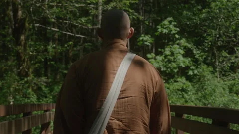 Bald Buddhist Monk Walking Alone Through... | Stock Video | Pond5