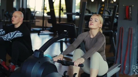 bald guy and girl with fair hair do seat... | Stock Video | Pond5