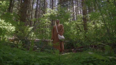 Bald Monk Standing with Eyes Closed in a... | Stock Video | Pond5