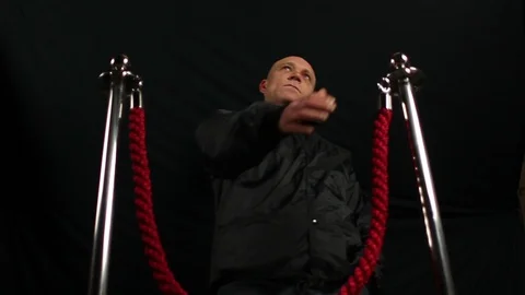 Bald Security Guard / Bouncer wearing bl... | Stock Video | Pond5