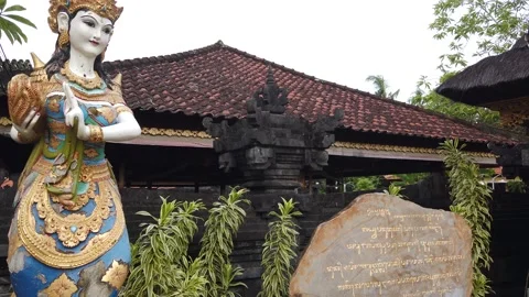 Balinese Female Deity Statue in the Entr... | Stock Video | Pond5