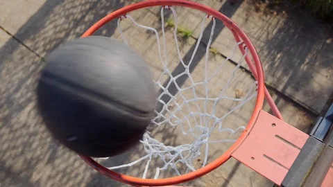 ball hits into hoop while playing basket... | Stock Video | Pond5