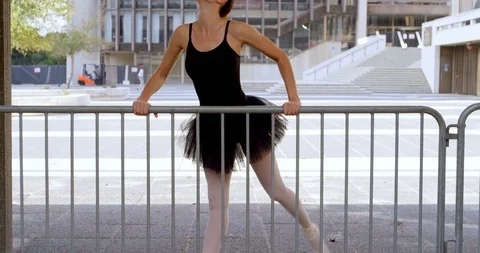 Ballet dancer dancing by railing 4k | Stock Video | Pond5