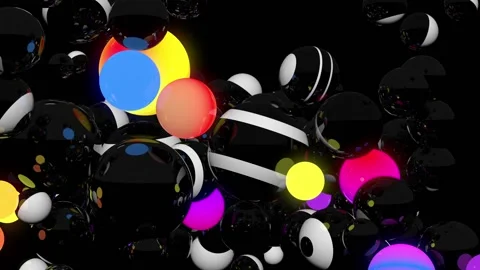 Balls bouncing around on a black backgro... | Stock Video | Pond5