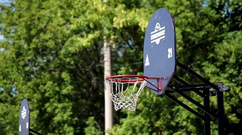 Balls flying into the basket at basketba... | Stock Video | Pond5