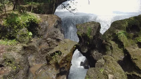 Bandung waterfall : water flowing down a... | Stock Video | Pond5