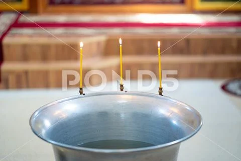 Baptismal font baptism in Orthodox Church. Stock Image #129560136