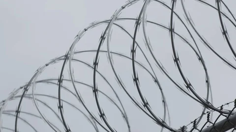 Barbed Razor Wire Fence Prison Jail | Stock Video | Pond5