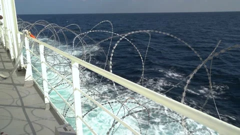 Barbed wire on railing ship. Protection ... | Stock Video | Pond5