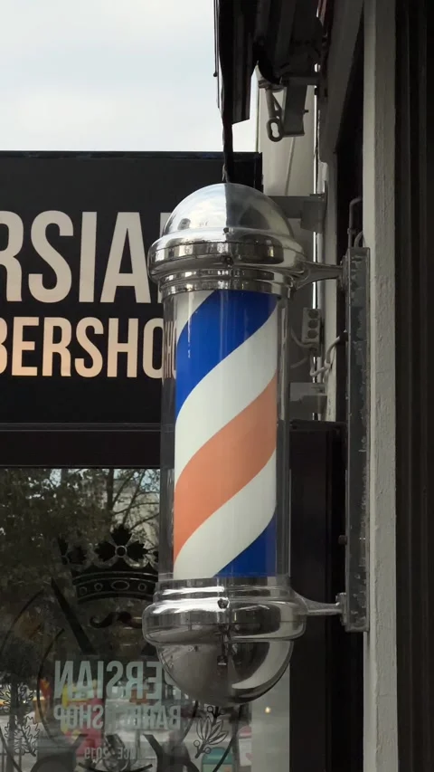 barber pole sign outdoors, vertical | Stock Video | Pond5