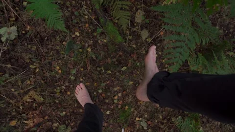 The bare feet and toes of a person in th... | Stock Video | Pond5