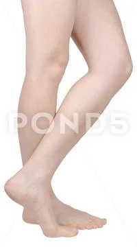Bare feet of a girl with flat feet, side view isolated on white ...