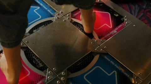 Bare Feet playing Dance Dance Revolution | Stock Video | Pond5