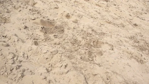 Bare feet run across the sand in slow mo... | Stock Video | Pond5