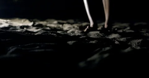 barefoot human is stepping on sand in ni... | Stock Video | Pond5