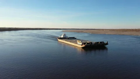 Barge floats on the river at sunset. Fli... | Stock Video | Pond5