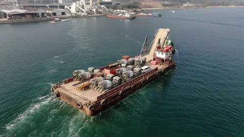 Barge loaded with Concrete mixer trucks ... | Stock Video | Pond5