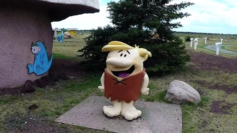 Barney Rubble Statue- Flintstone Prehist... | Stock Video | Pond5
