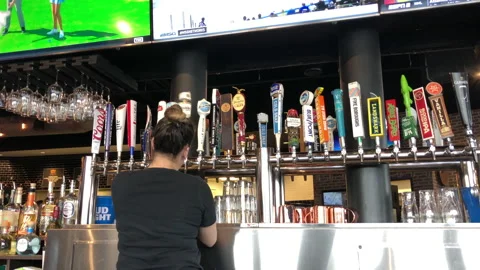 Bartender Gets Beer From Tap View of Typ... | Stock Video | Pond5