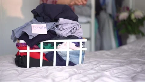 A basket of clothes for donating to Char... | Stock Video | Pond5
