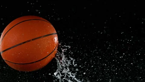 Basketball ball on water surface with wa... | Stock Video | Pond5