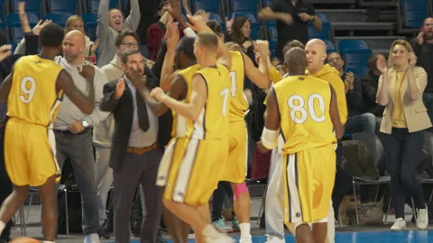 Basketball Game Yellow Team Celebration | Stock Video | Pond5