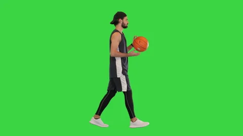 Basketball player walking with ball in h... | Stock Video | Pond5