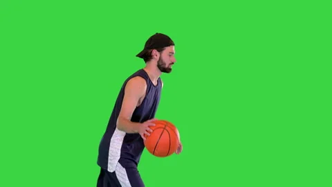 Basketball player walking bouncing a bal... | Stock Video | Pond5
