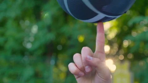 Basketball spinning on one finger on out... | Stock Video | Pond5