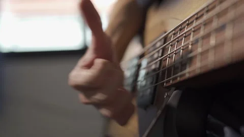 Bassist playing electric bass with slapp... | Stock Video | Pond5